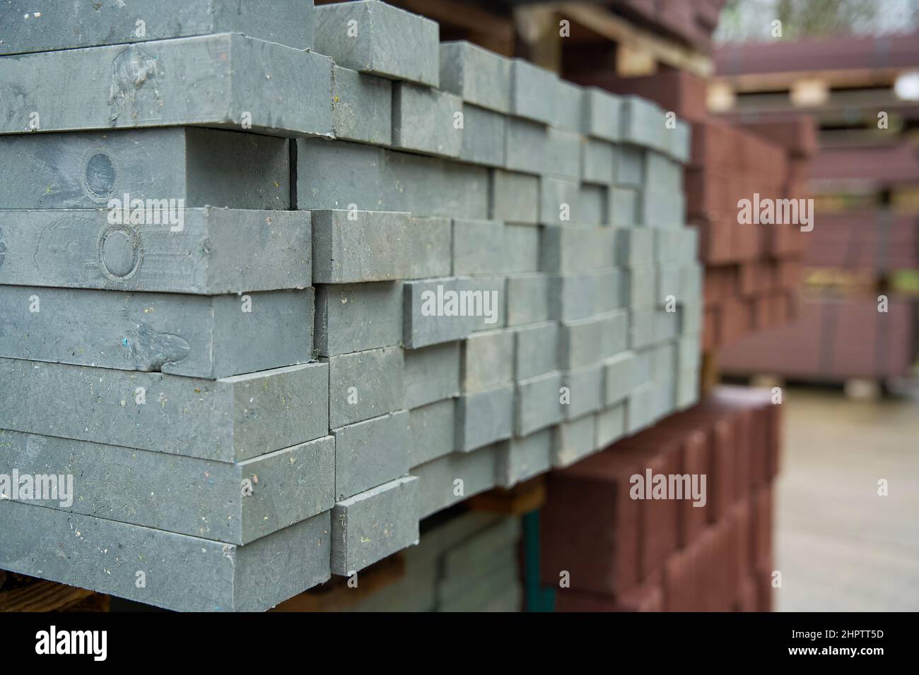 Close-up of circular construction material made from re-used waste ...