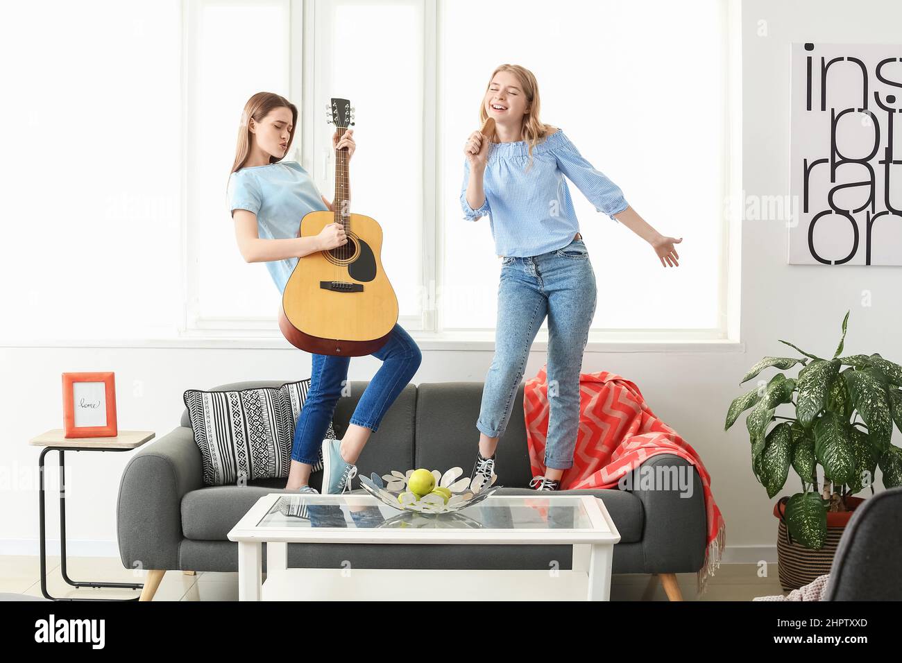 Happy young sisters having fun at home Stock Photo - Alamy