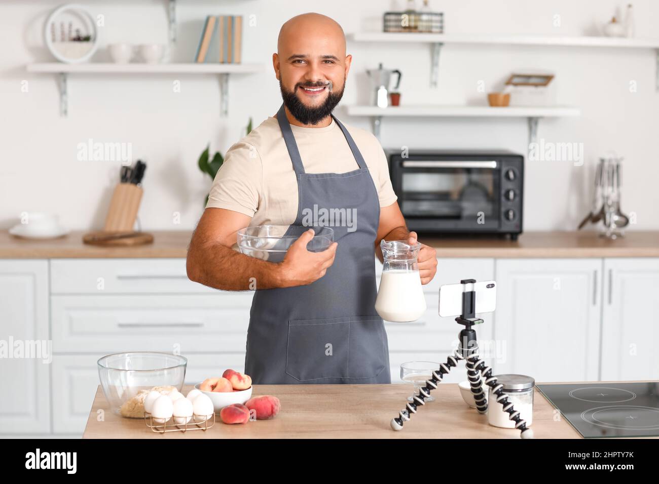 Handsome man jug milk hi-res stock photography and images - Alamy