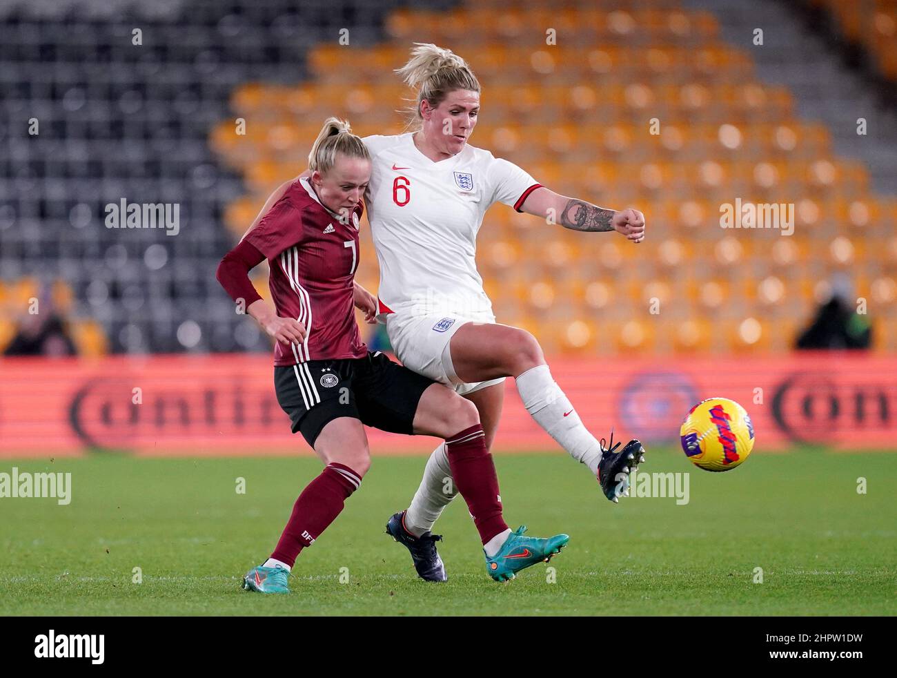Germany's Lea Schuller (left) and England's Millie Bright battle for ...