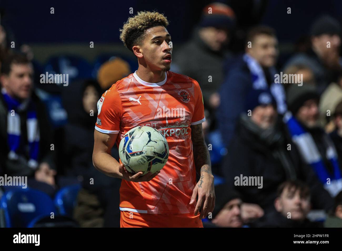 Jordan Lawrence-Gabriel #4 of Blackpool takes a throw-in Stock Photo ...