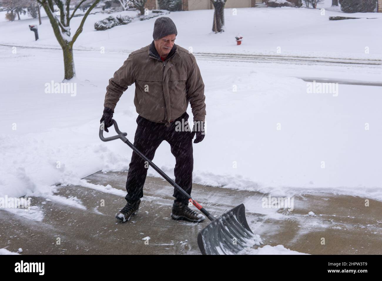 Old man in blue winter hi-res stock photography and images - Alamy