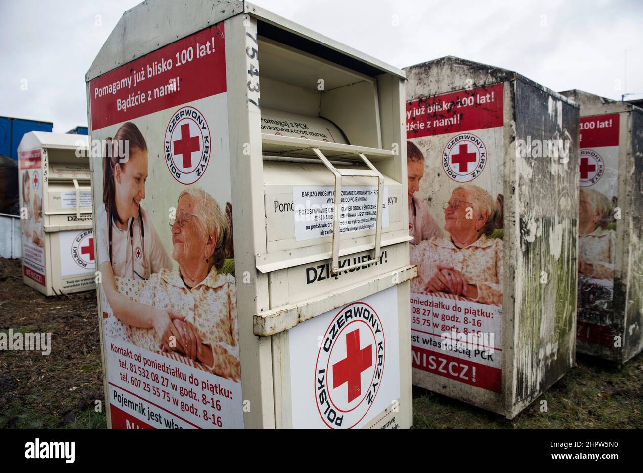 Lublin, Poland. 23rd Feb, 2022. Boxes for charity clothes are seen ...