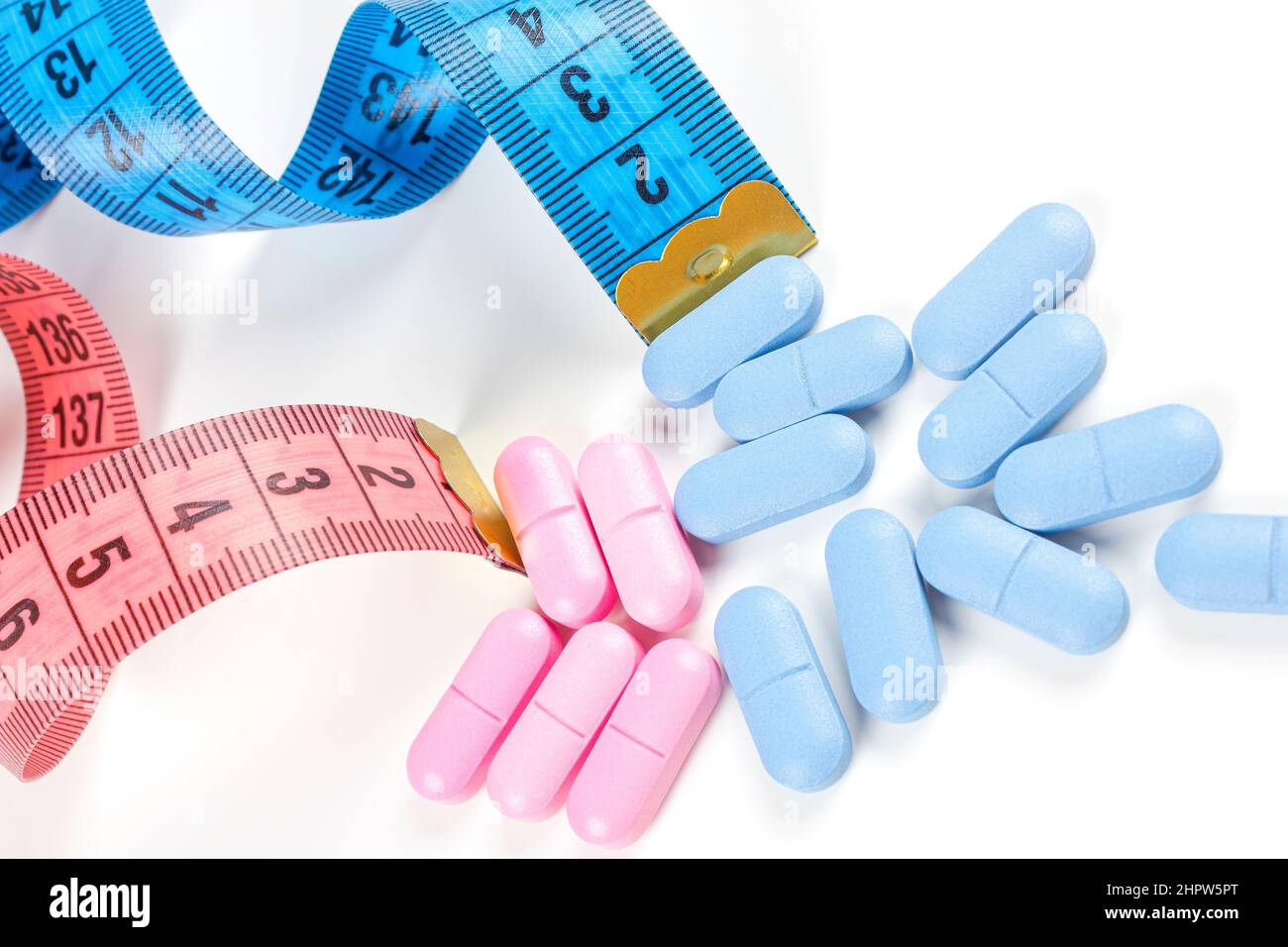 Pills measuring tape concept hi-res stock photography and images - Alamy