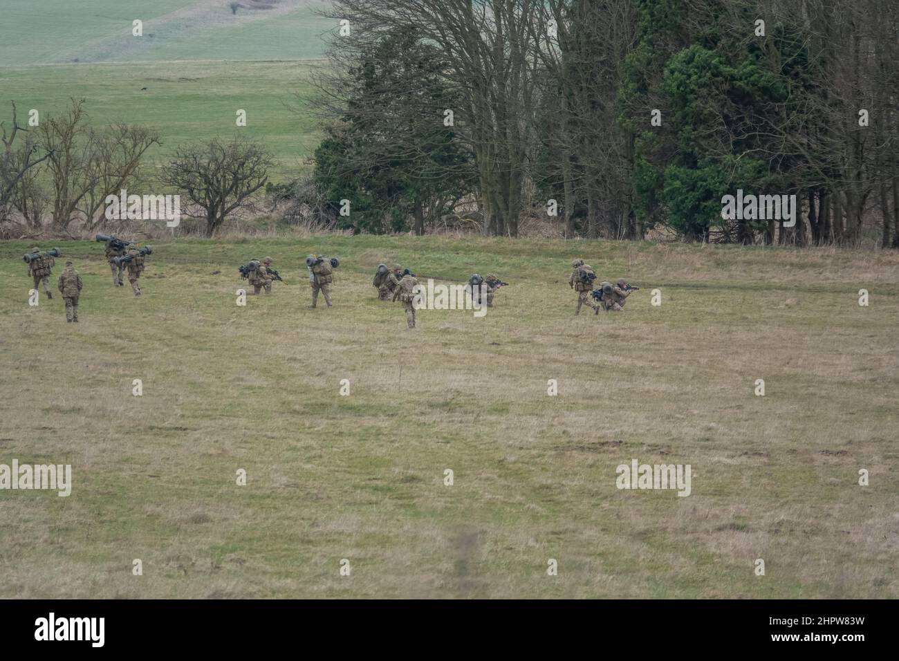 British army soldiers on a military tabbing exercise with 40Kg bergen ...