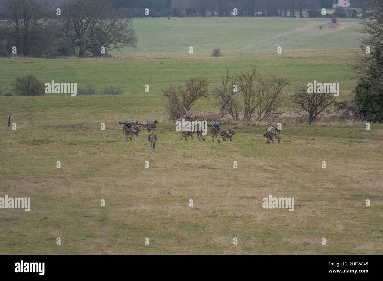 British army soldiers on a military tabbing exercise with 40Kg bergen ...