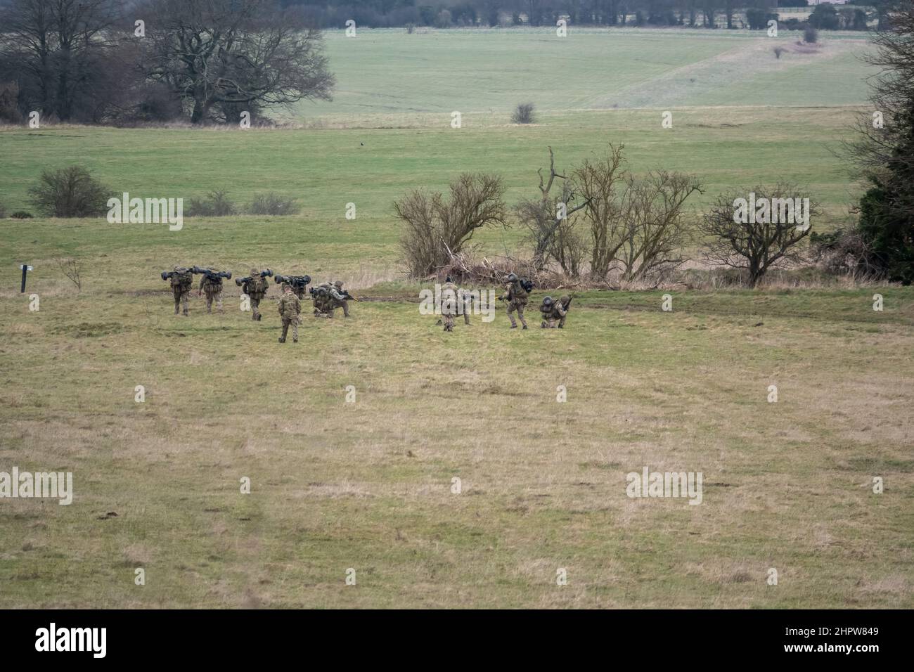 British army soldiers on a military tabbing exercise with 40Kg bergen ...