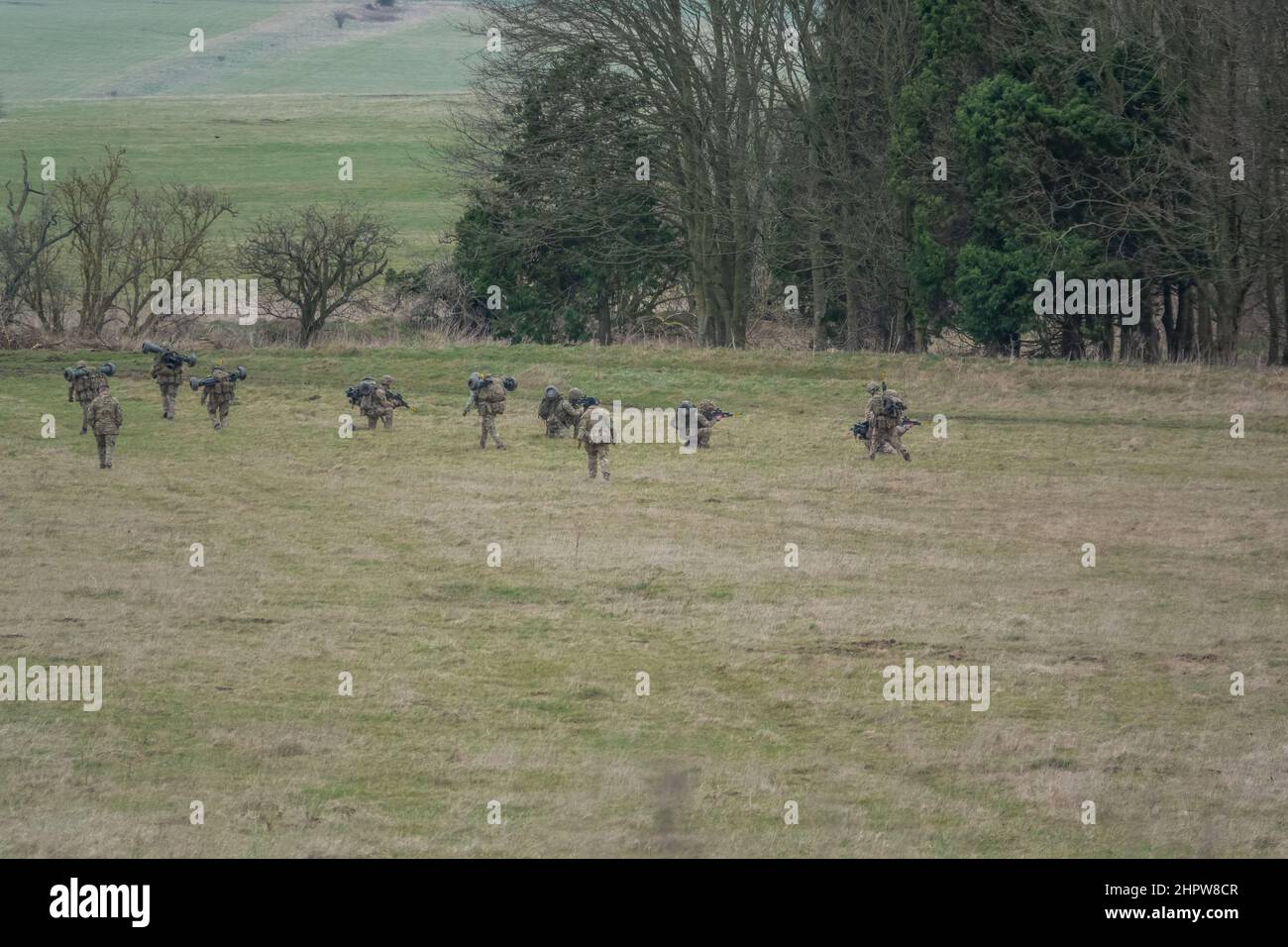 army soldiers on a military tabbing exercise with 40Kg bergen and anti ...