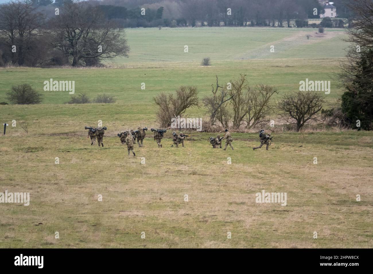 British army soldiers on a military tabbing exercise with 40Kg bergen ...