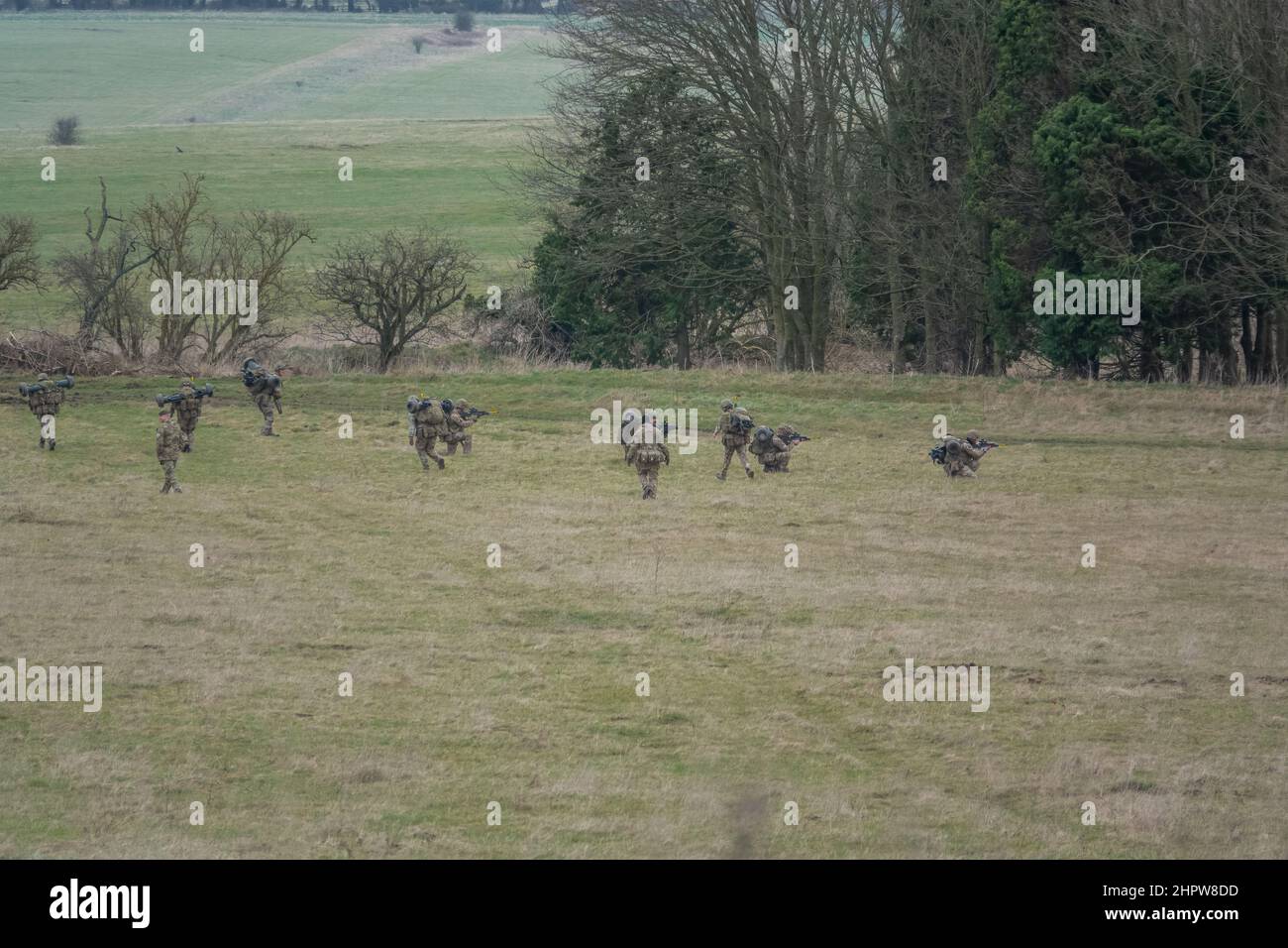 army soldiers on a military tabbing exercise with 40Kg bergen and anti ...