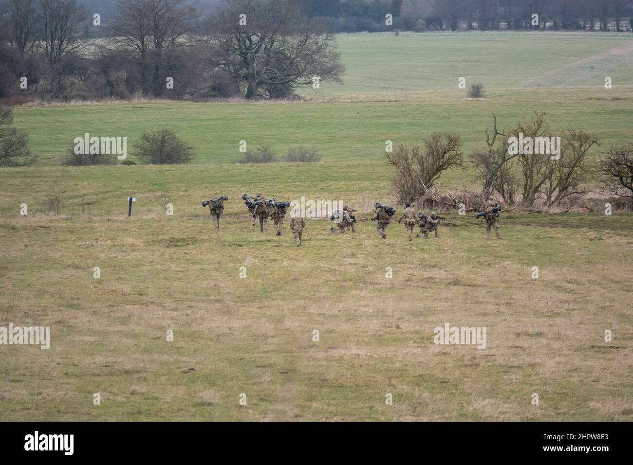 British army soldiers on a military tabbing exercise with 40Kg bergen ...