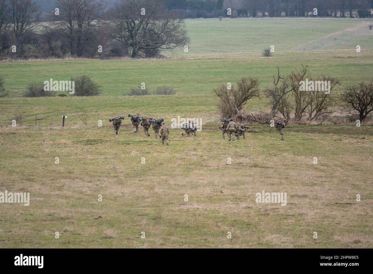 British army soldiers on a military tabbing exercise with 40Kg bergen ...