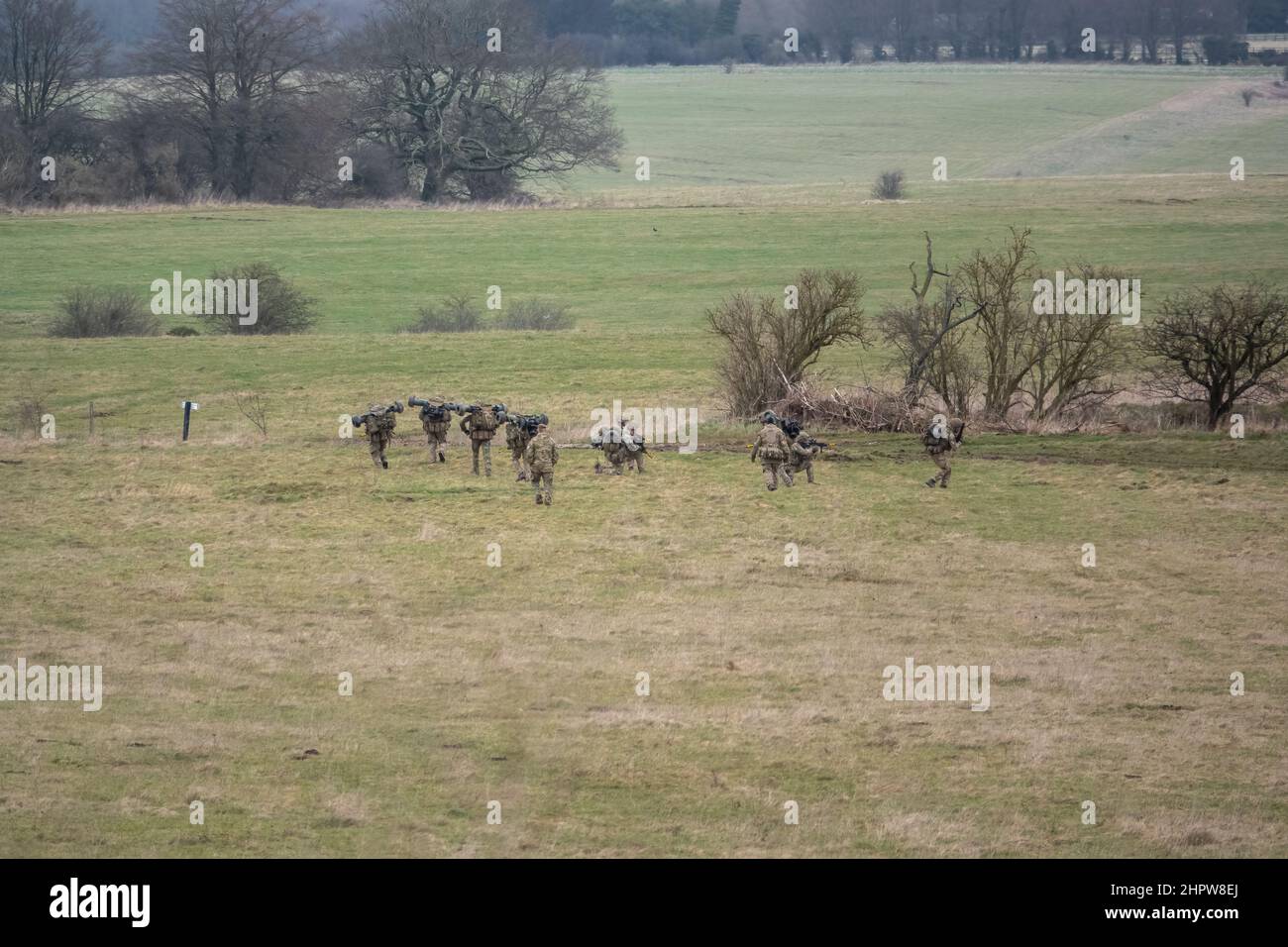 British army soldiers on a military tabbing exercise with 40Kg bergen ...