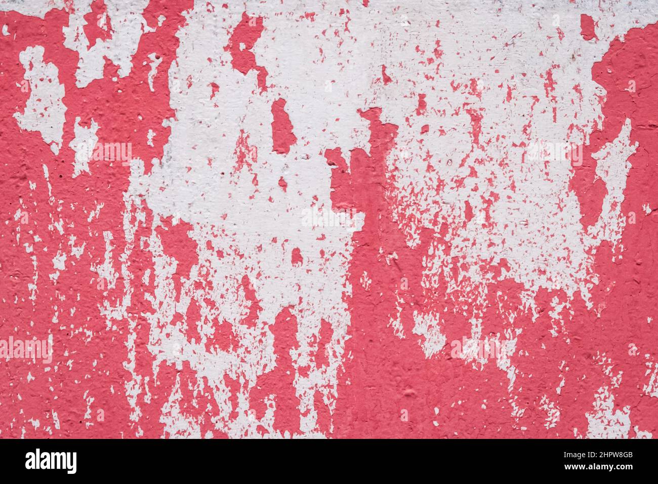 Red peeling paint abstract color pattern design worn weathered white wall surface texture ...