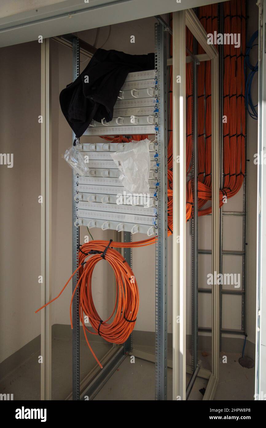 many network cables run in a new building to a server cabinet Stock ...
