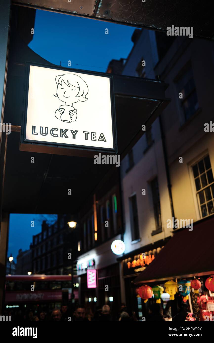 Lucky Tea sign in London's China town as dusk approaches Stock Photo ...