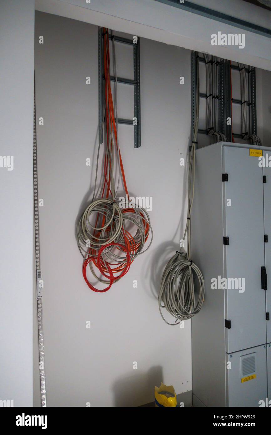 Electricity cables hanging on construction hi-res stock photography and ...