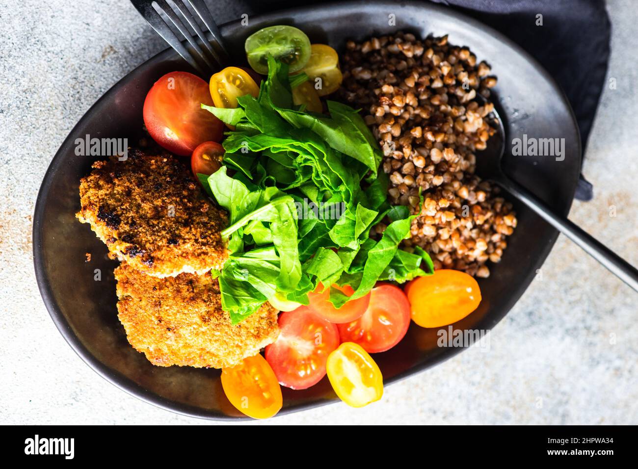 Healthy vegetable and meat cutlet cowl with raw and fresh ingredients ...