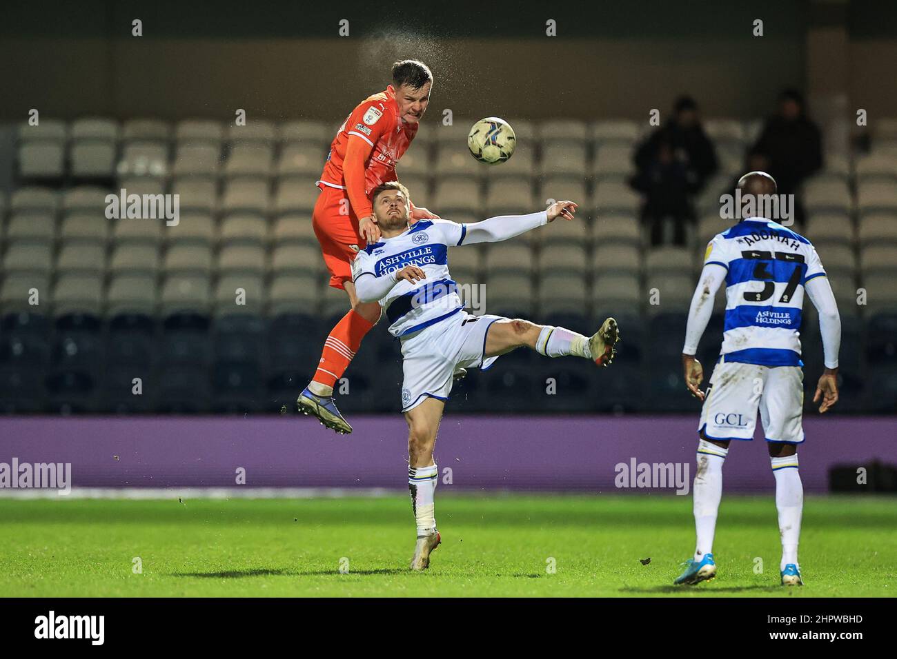 London, UK. 23rd Feb, 2022. Jordan Thorniley #34 of Blackpool wins the ...