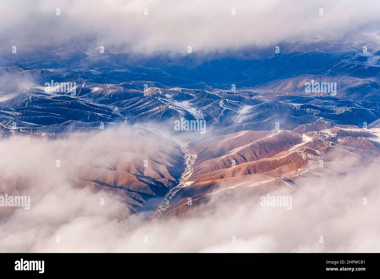beautiful view from the aircraft to the mountains of the Himalaya on ...
