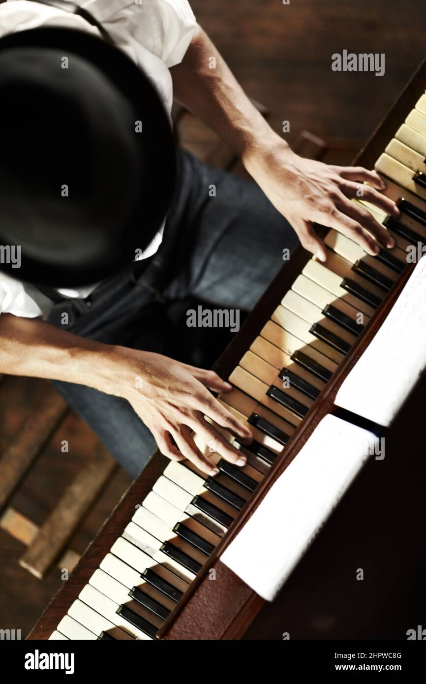 The makings of a creative genius. High-angle view of a young musician ...