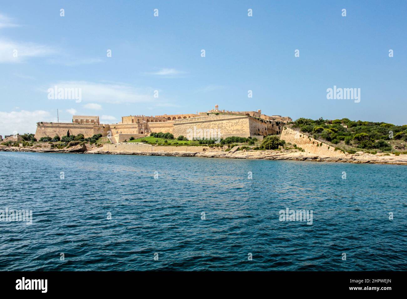 The city walls of Valletta with old castle - Malta Stock Photo - Alamy