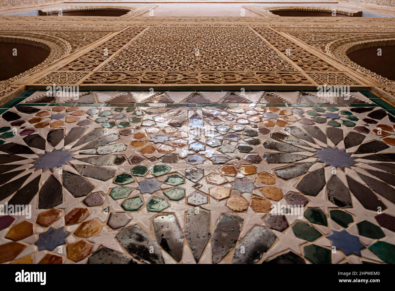 tiles with geometric and arabesque shapes on a wall of some Arab ...