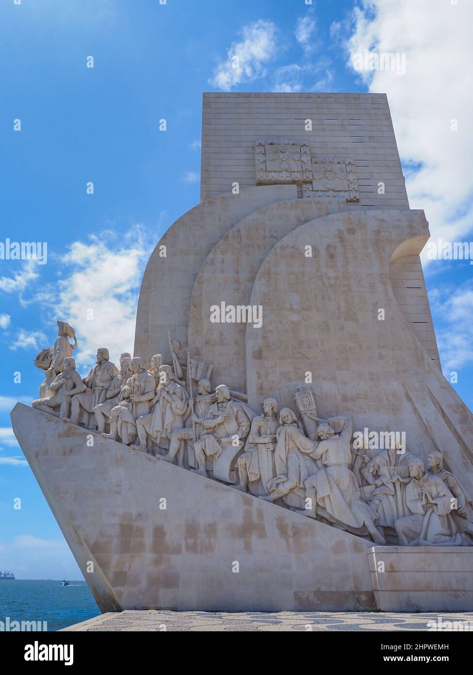 Waterfront Promenade of Belem, with tall concrete monument of the ...