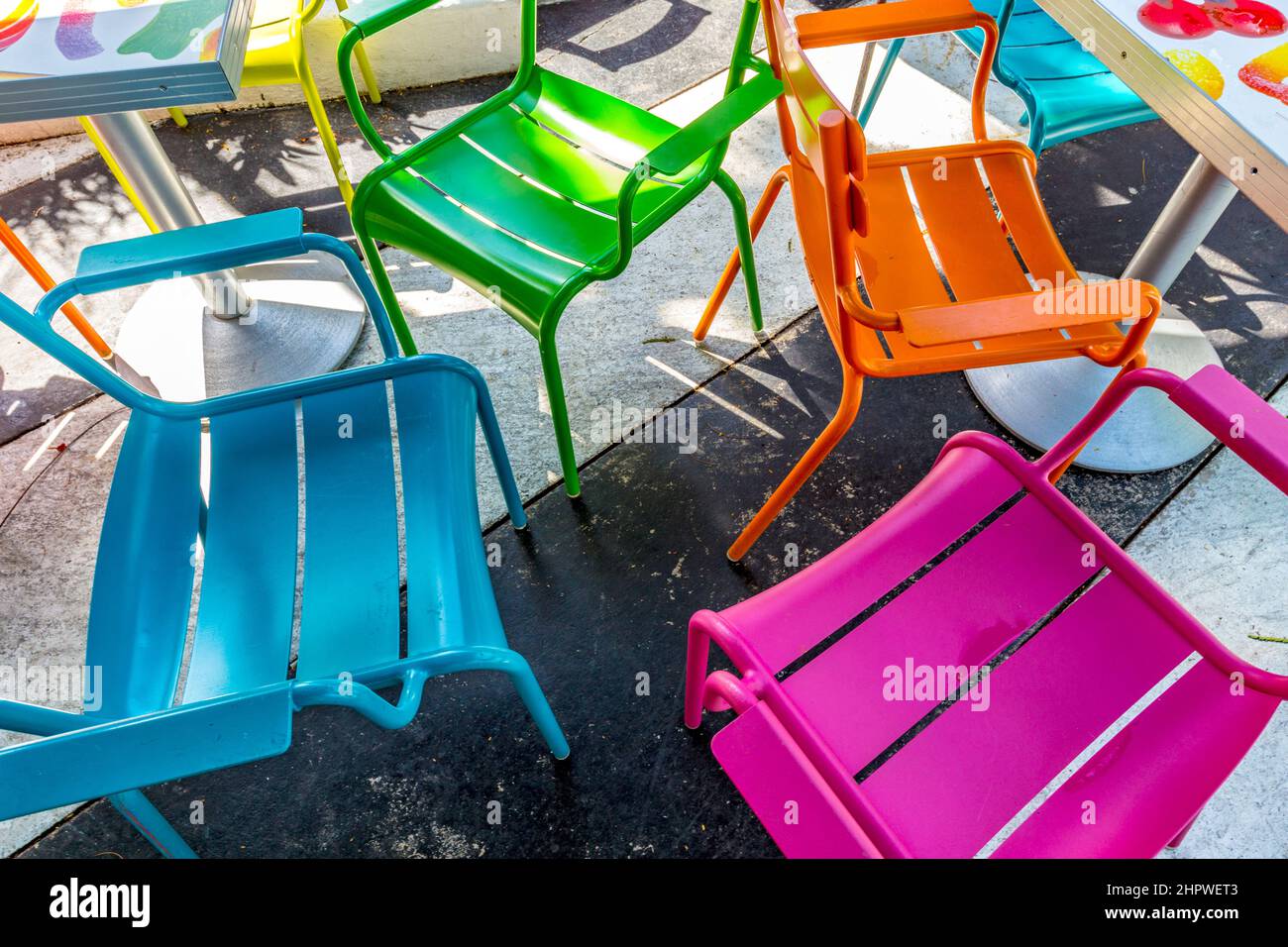 detail of colorful chairs at an outdoor restaurant in Miami Stock Photo ...