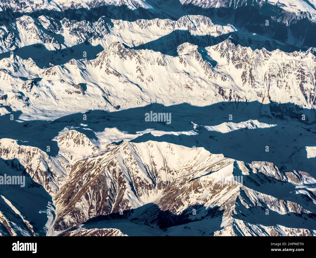 scenic snow covered mountains at the Alps Stock Photo - Alamy