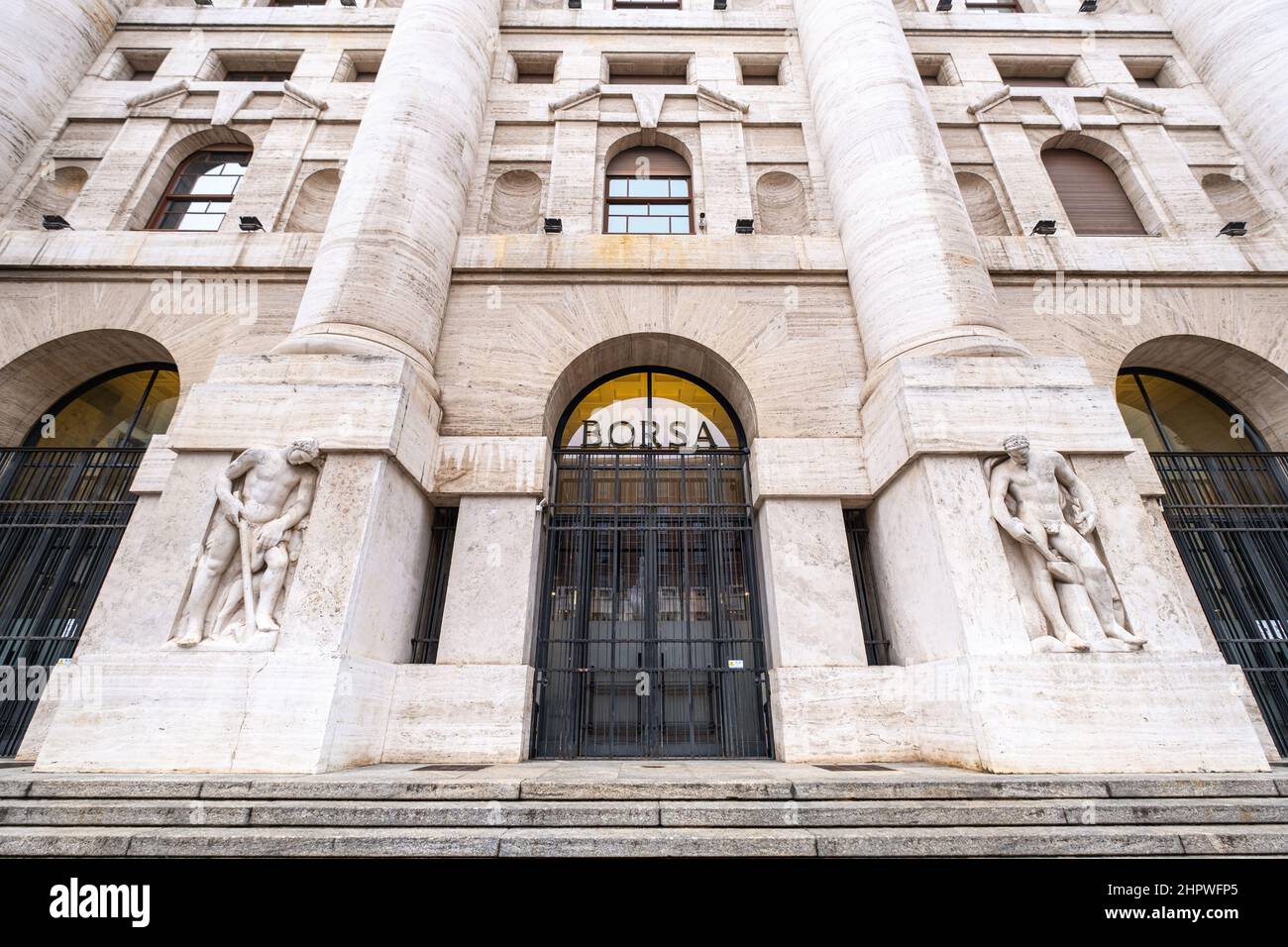 Milan Stock Exchange entrance on Piazza Affari - The building shows the ...