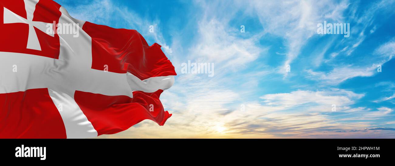 flag of Volhynian region , Ukraine at cloudy sky background on sunset ...