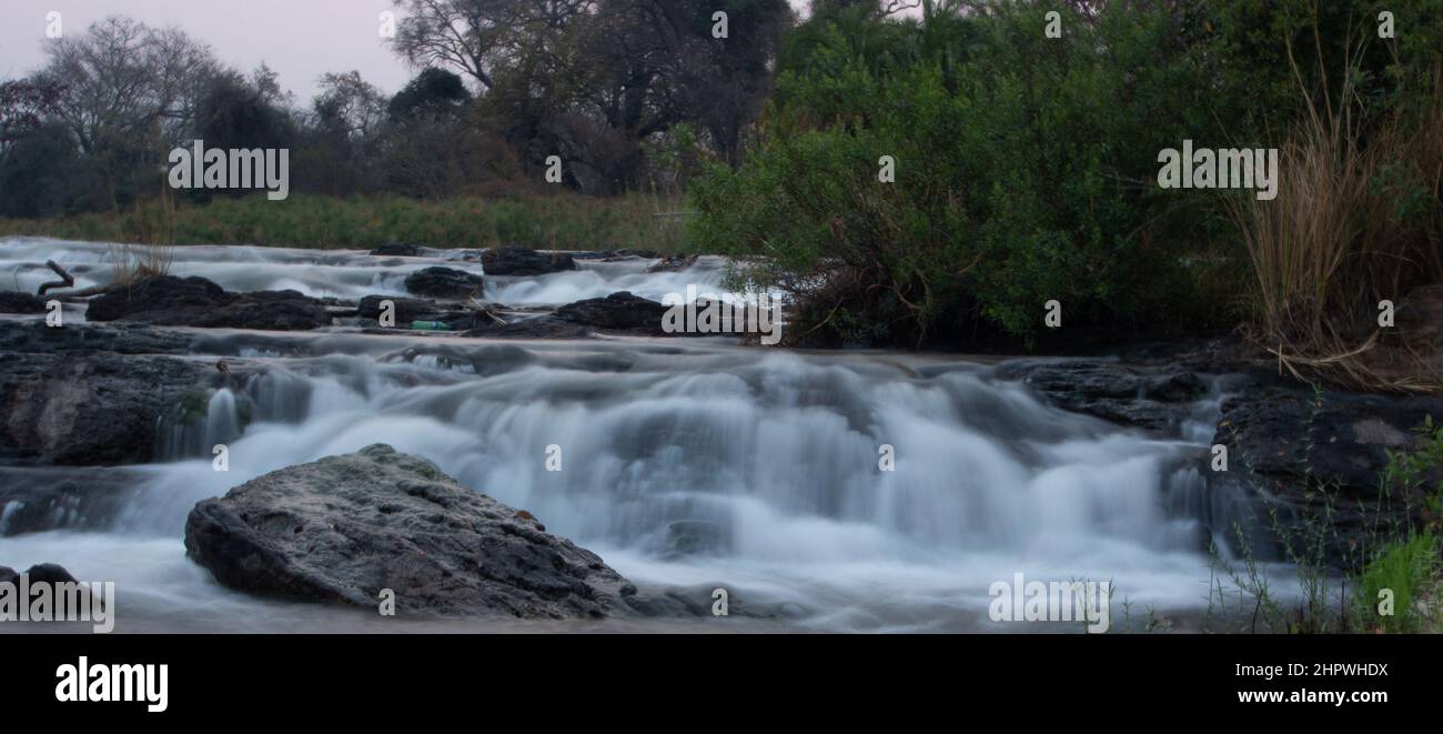 Long exposure image of the Popa Waterfalls located on the Kwando River ...