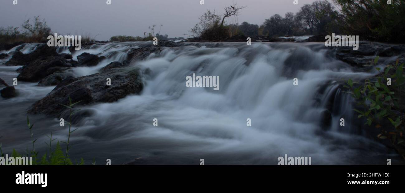 Long exposure image of the Popa Waterfalls located on the Kwando River ...