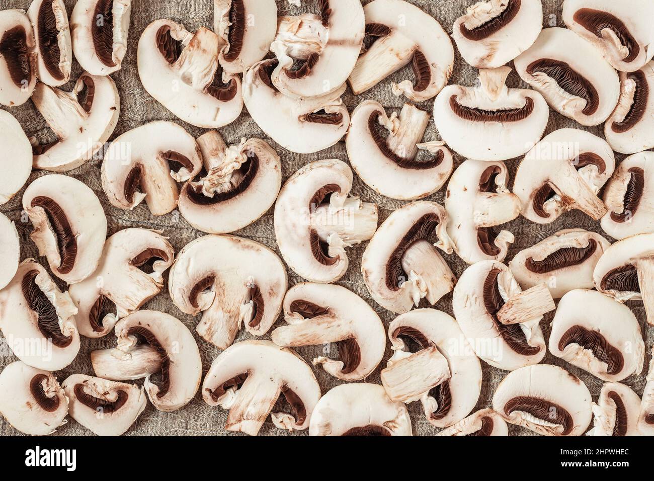 Food pattern of champignon slices on sackcloth background. Flat lay ...