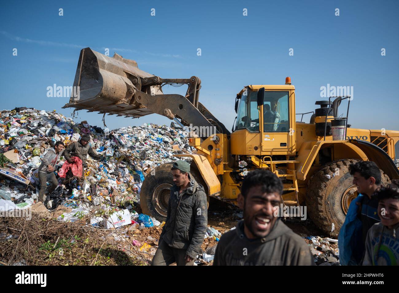 Beirut, Lebanon. 18th Feb, 2022. Day laborers collect recyclable items ...