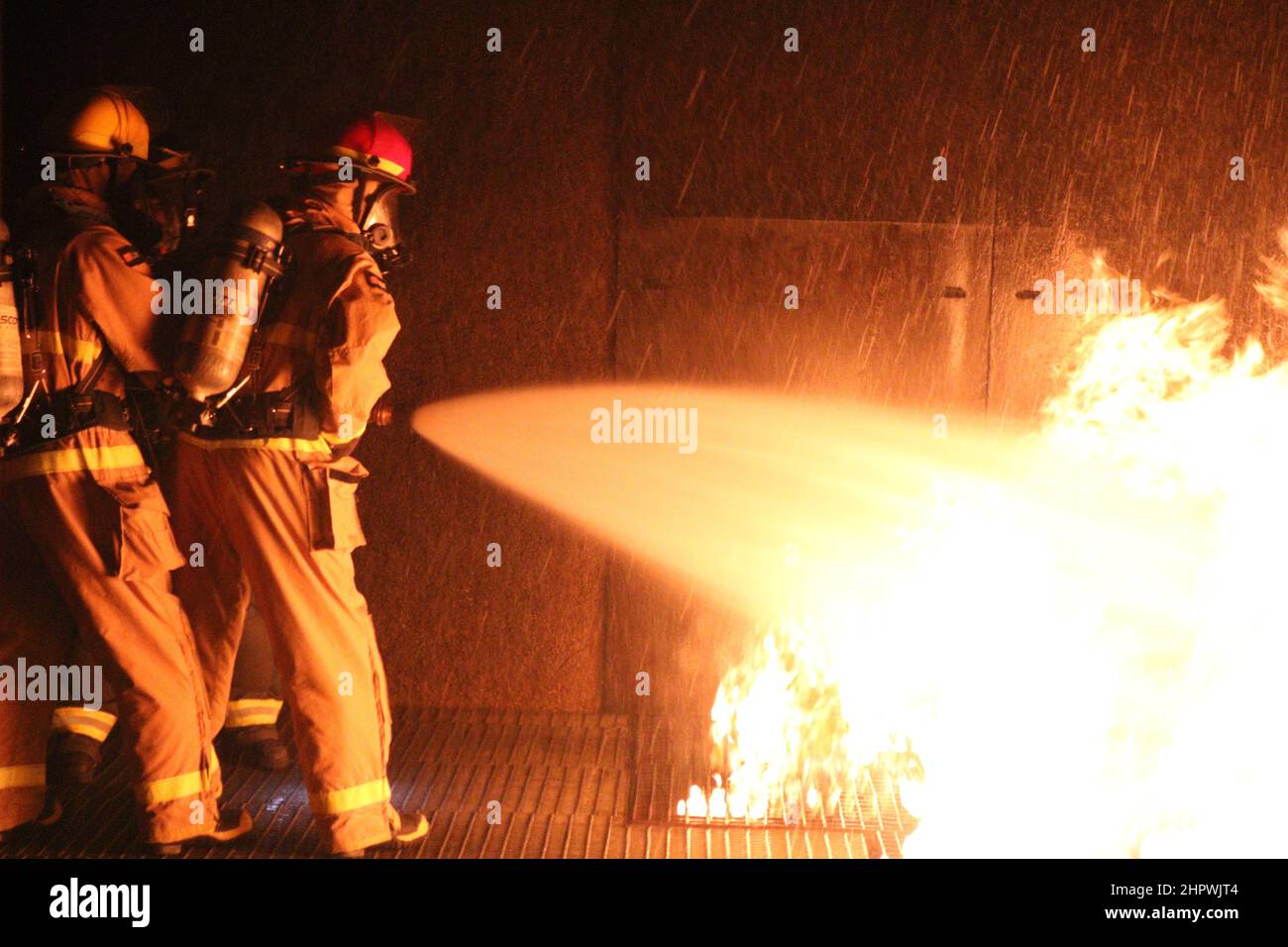 Officer Candidate School (OCS) class 08-22 students extinguish a ...