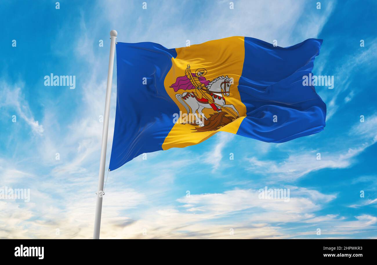flag of Kyiv region , Ukraine at cloudy sky background on sunset ...