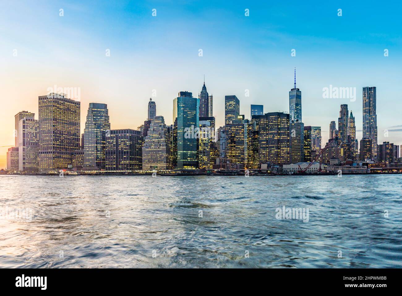 Manhattan Downtown urban view with Brooklyn bridge in sunset Stock Photo - Alamy