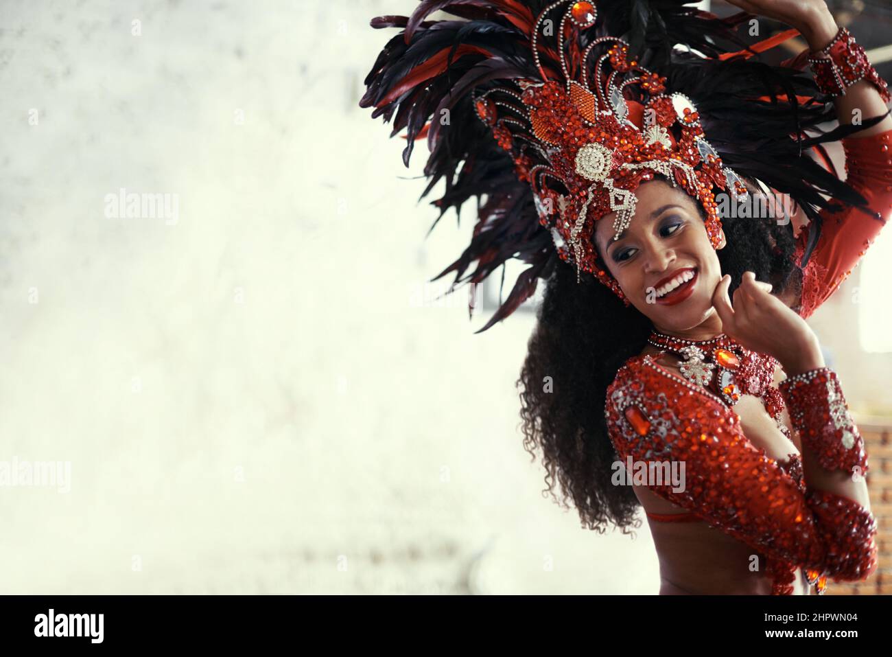 Performing live brings a smile to all. Cropped shot of a beautiful ...