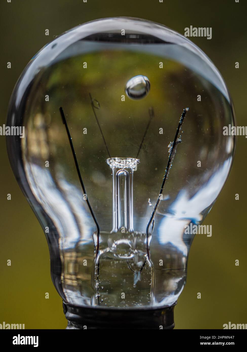 Light bulb filled with water drops, still life, close-up Stock Photo ...