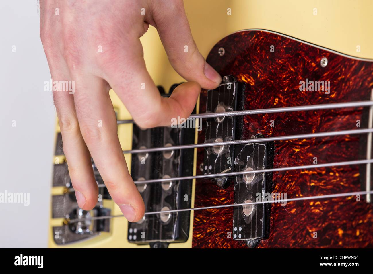 detail of man playing bass guitar Stock Photo - Alamy