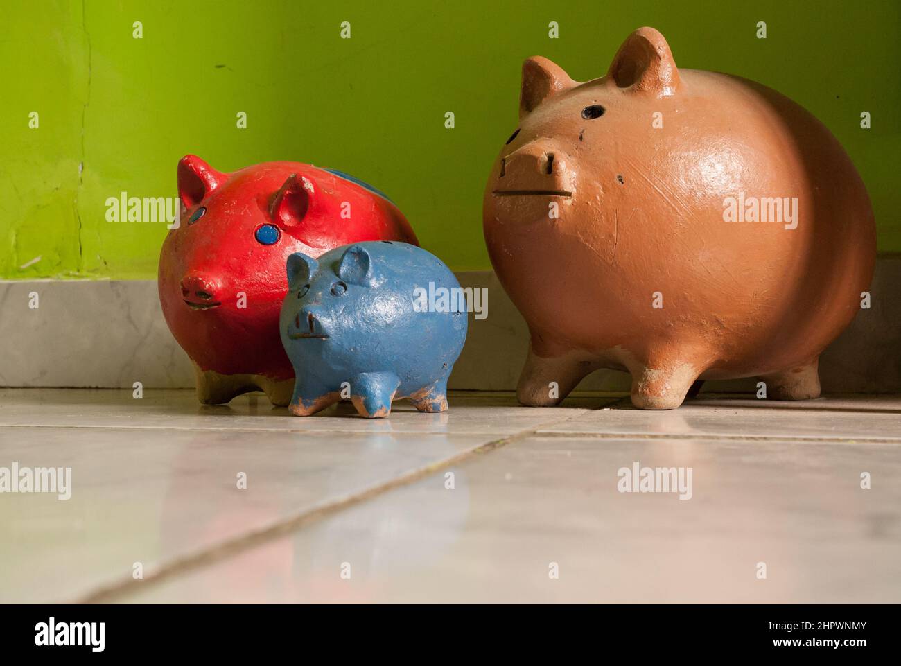 Three clay pigs hi-res stock photography and images - Alamy