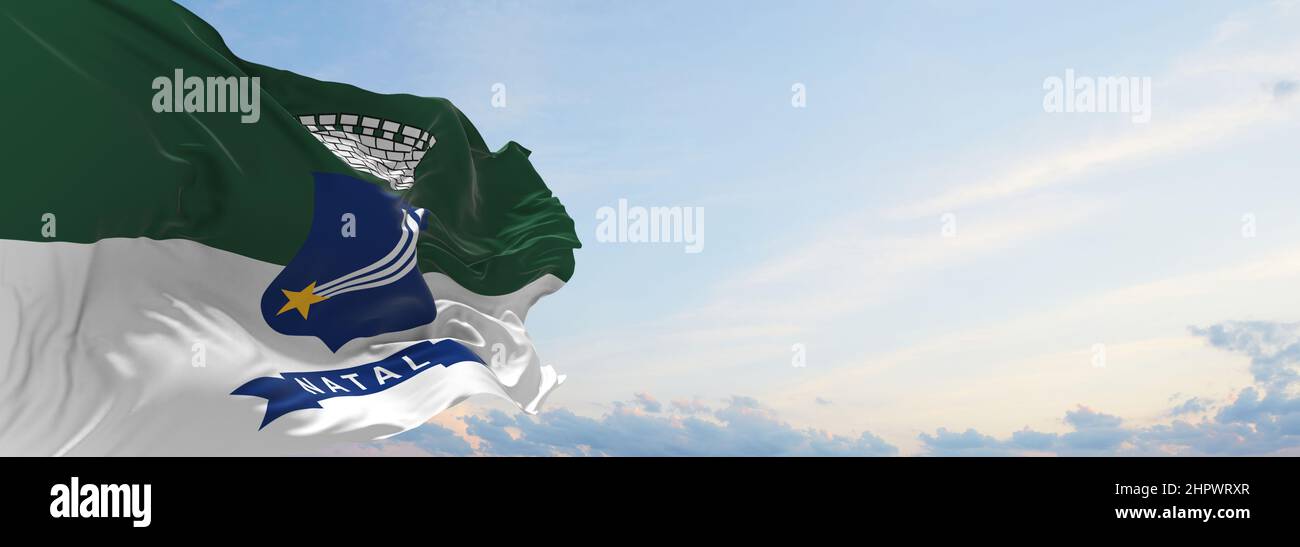 flag of Natal , Brazil at cloudy sky background on sunset, panoramic ...