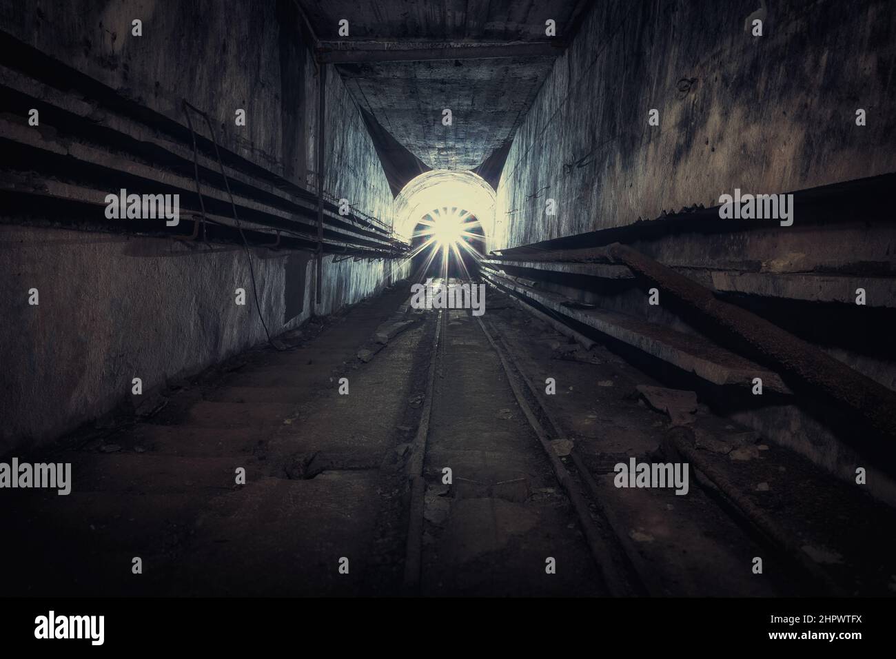 Geocaching in an old underground bunker with a flashlight Stock Photo ...