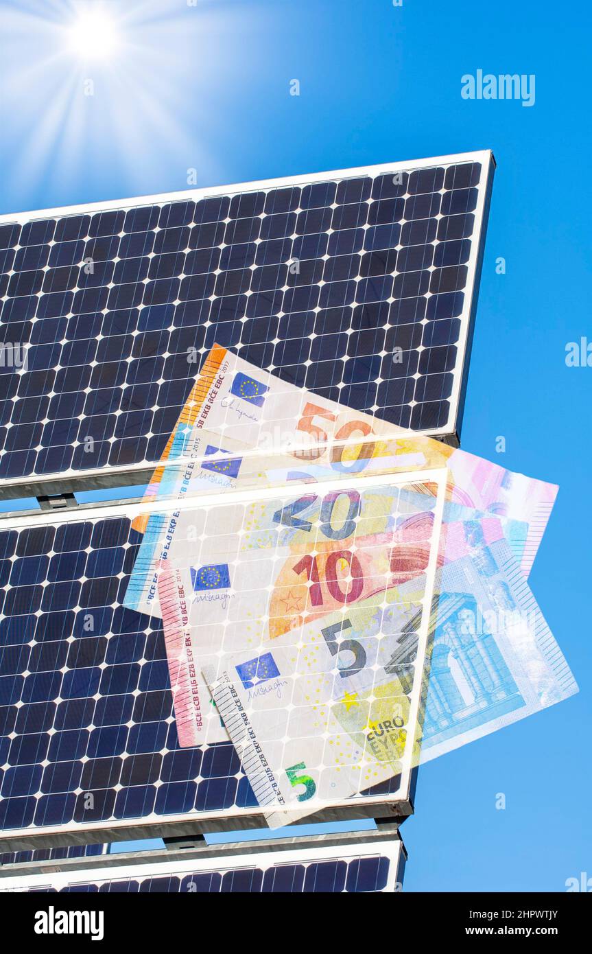 Photomontage, symbolic image energy costs, solar modules, banknotes ...