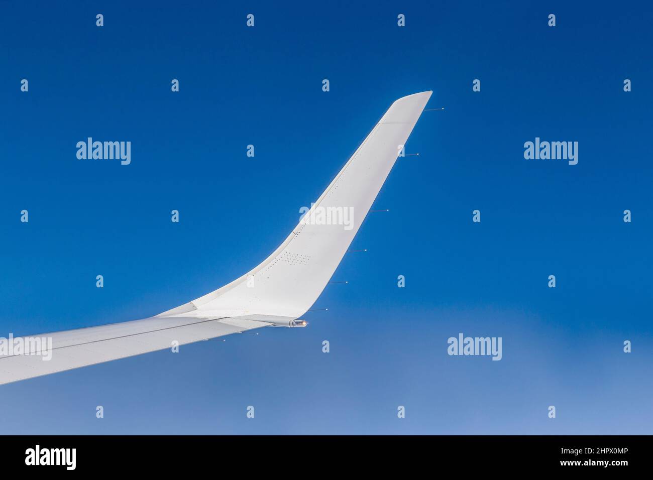 detail of aircraft wing in the sky Stock Photo - Alamy