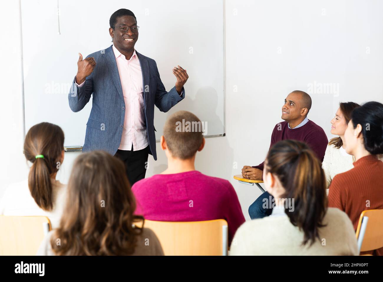 University teacher conducts lesson for students Stock Photo - Alamy
