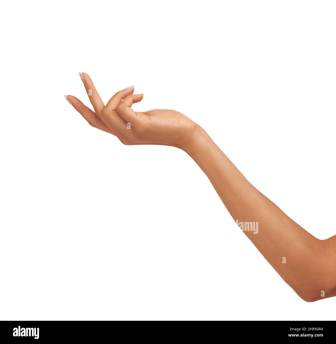 Natural and healthy skin. A young womans hand isolated on a white ...