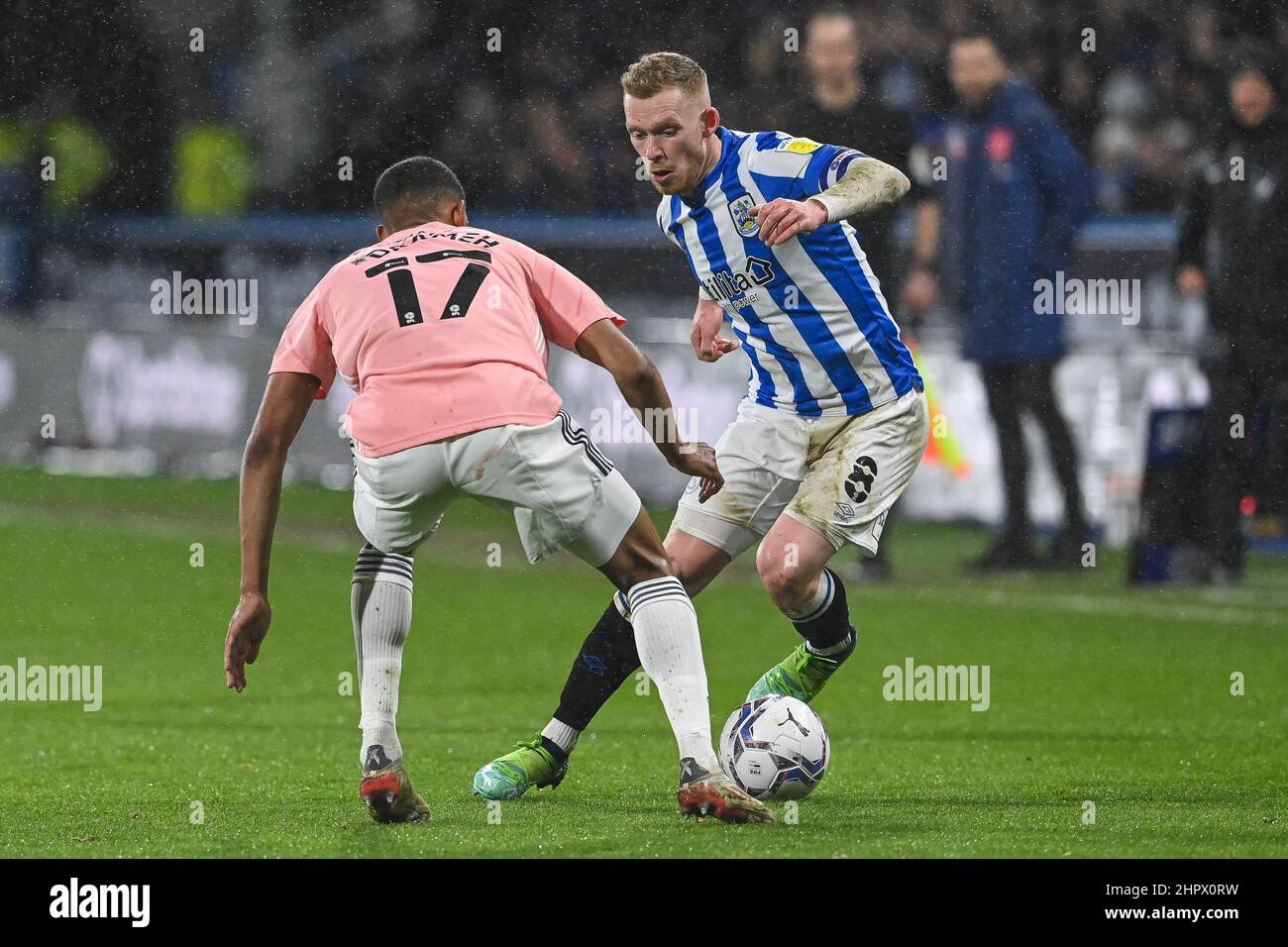 Lewis O'Brien #8 of Huddersfield Town takes on Cody Drameh #17 of ...